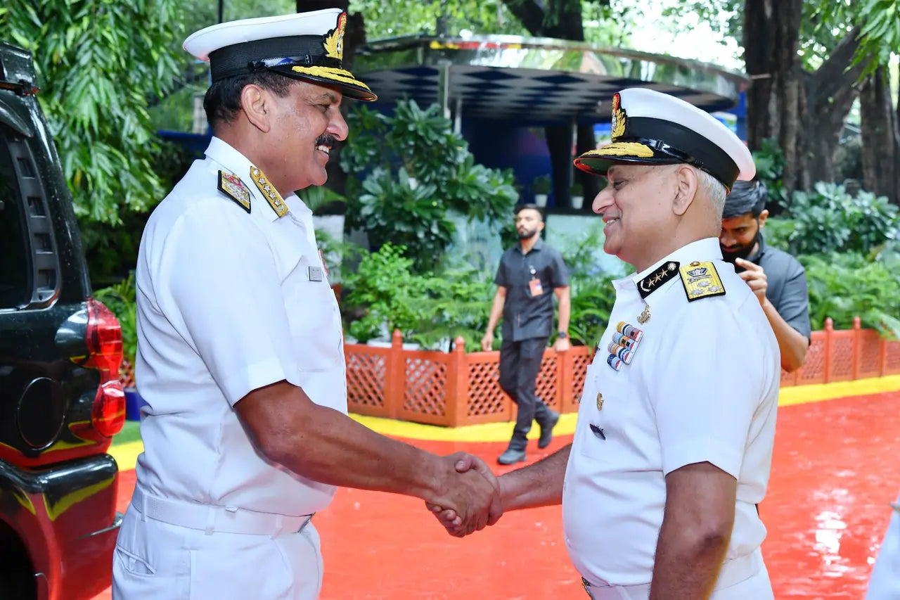 Navy Chief Emphasizes Enhanced Cooperation with Coast Guard at ...